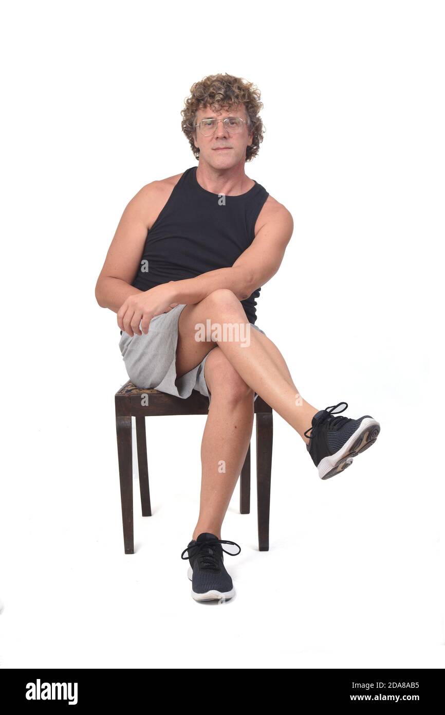 front view of a man sitting on white background Stock Photo - Alamy