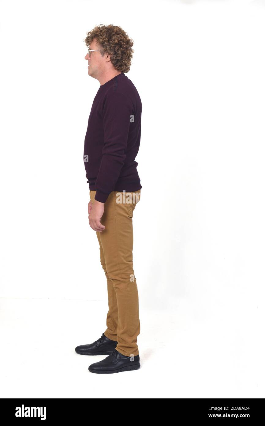 full portrait of a man, side view with curly hair and white background ...