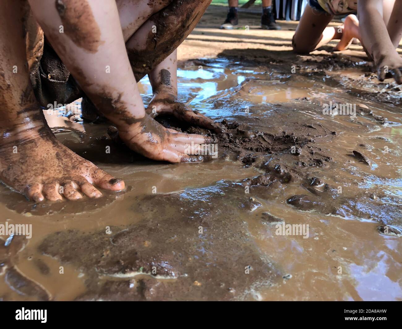 Playing in the mud hi-res stock photography and images - Alamy