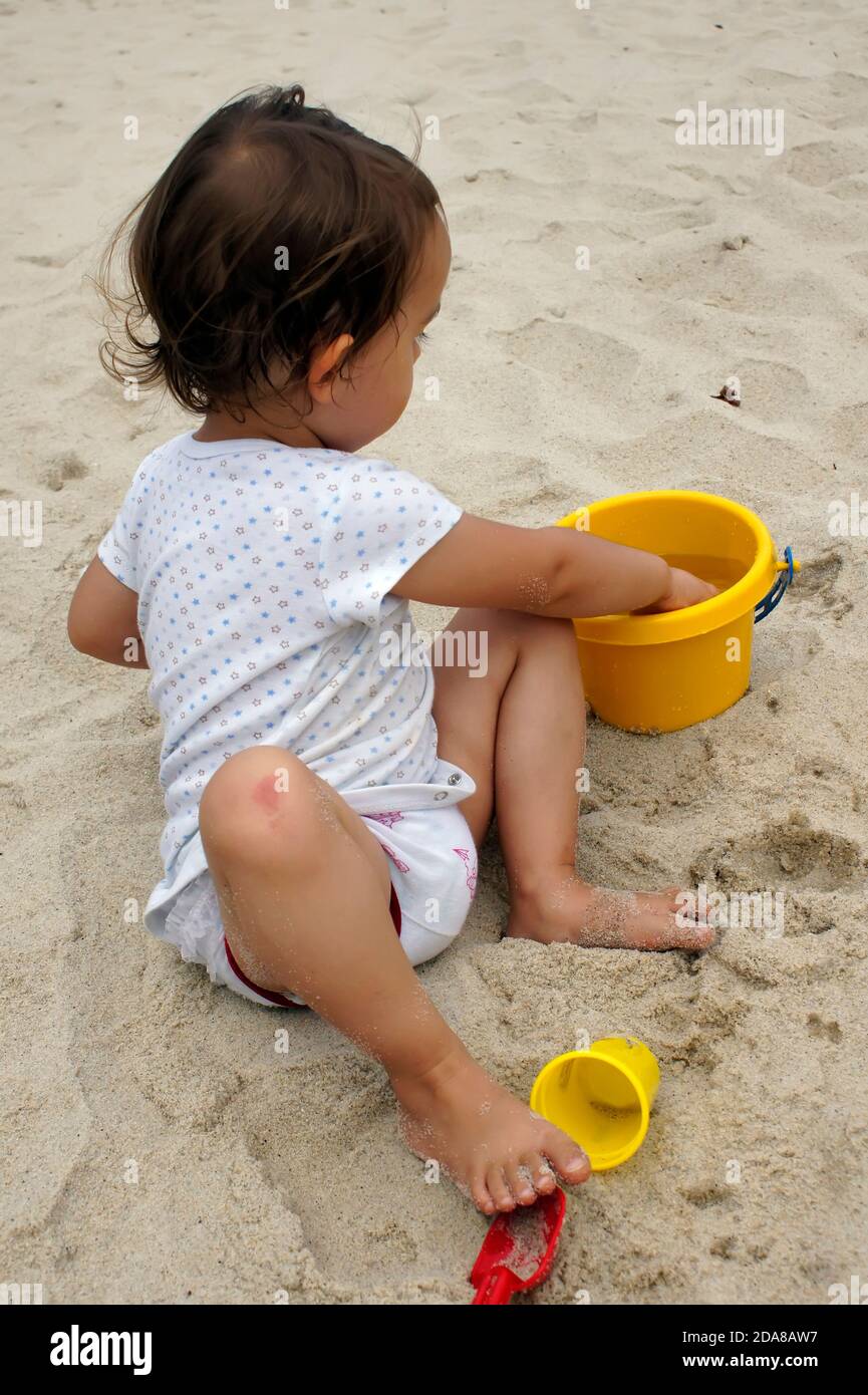 Baby playing sand beach hi-res stock photography and images - Alamy