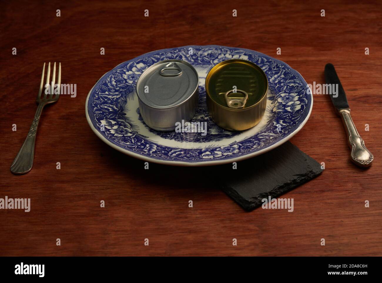 Different types of cans with prepared foods for consumption, vegetables ...