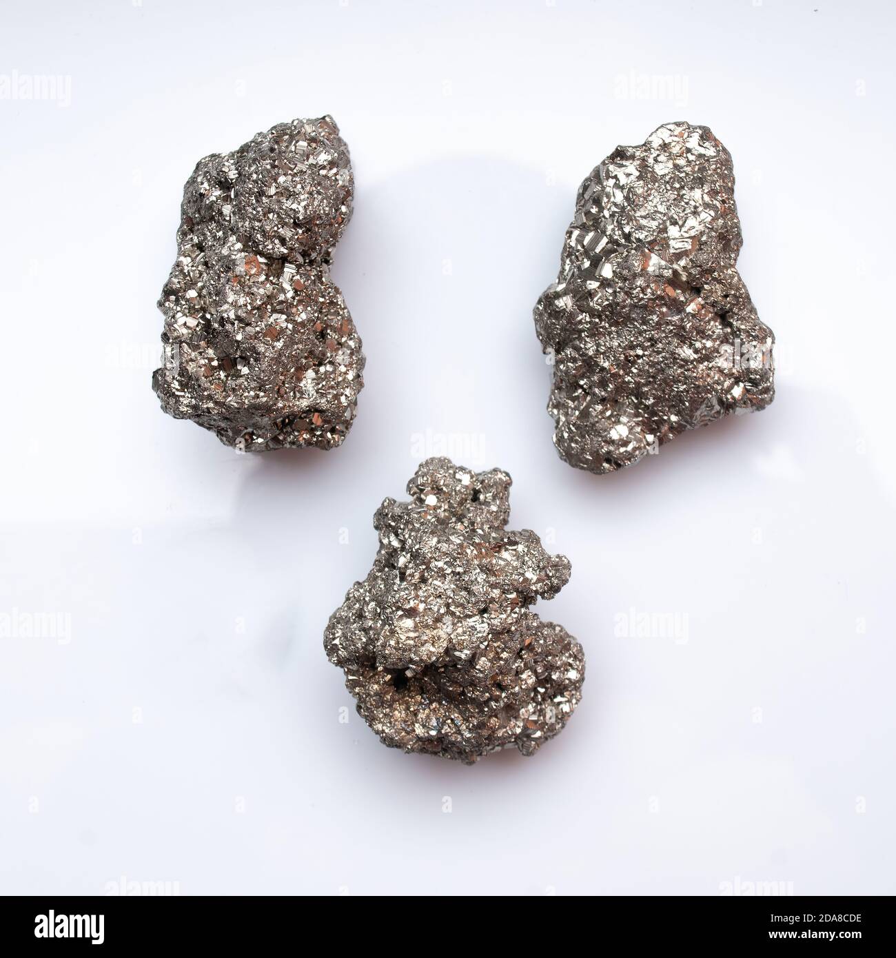Natural mineral pyrite on white background Stock Photo - Alamy