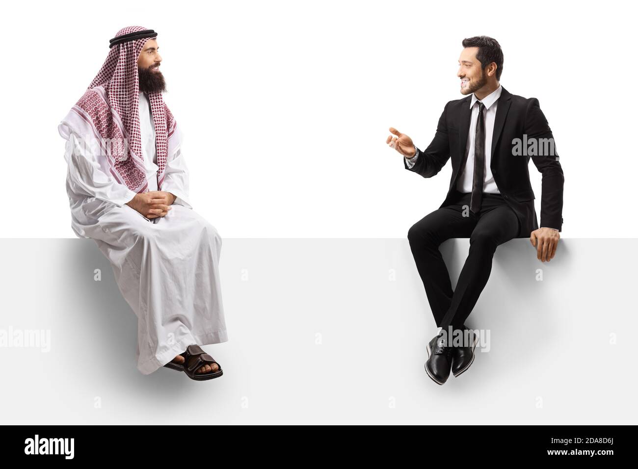 Full length profile shot of a saudi arab man talking to a businessman ...