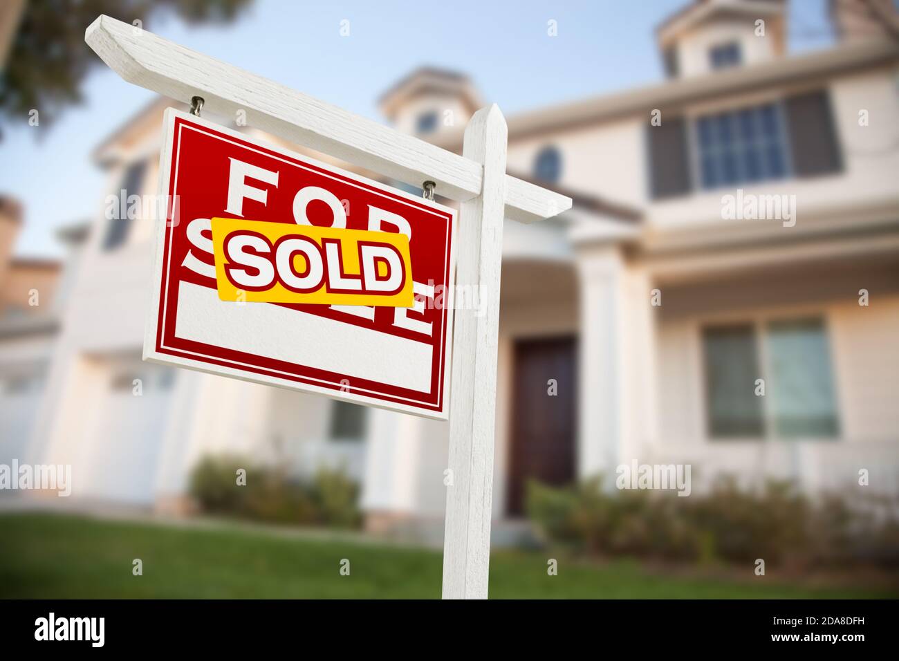 Home For Sale Real Estate Sign in Front of New House Stock Photo - Alamy