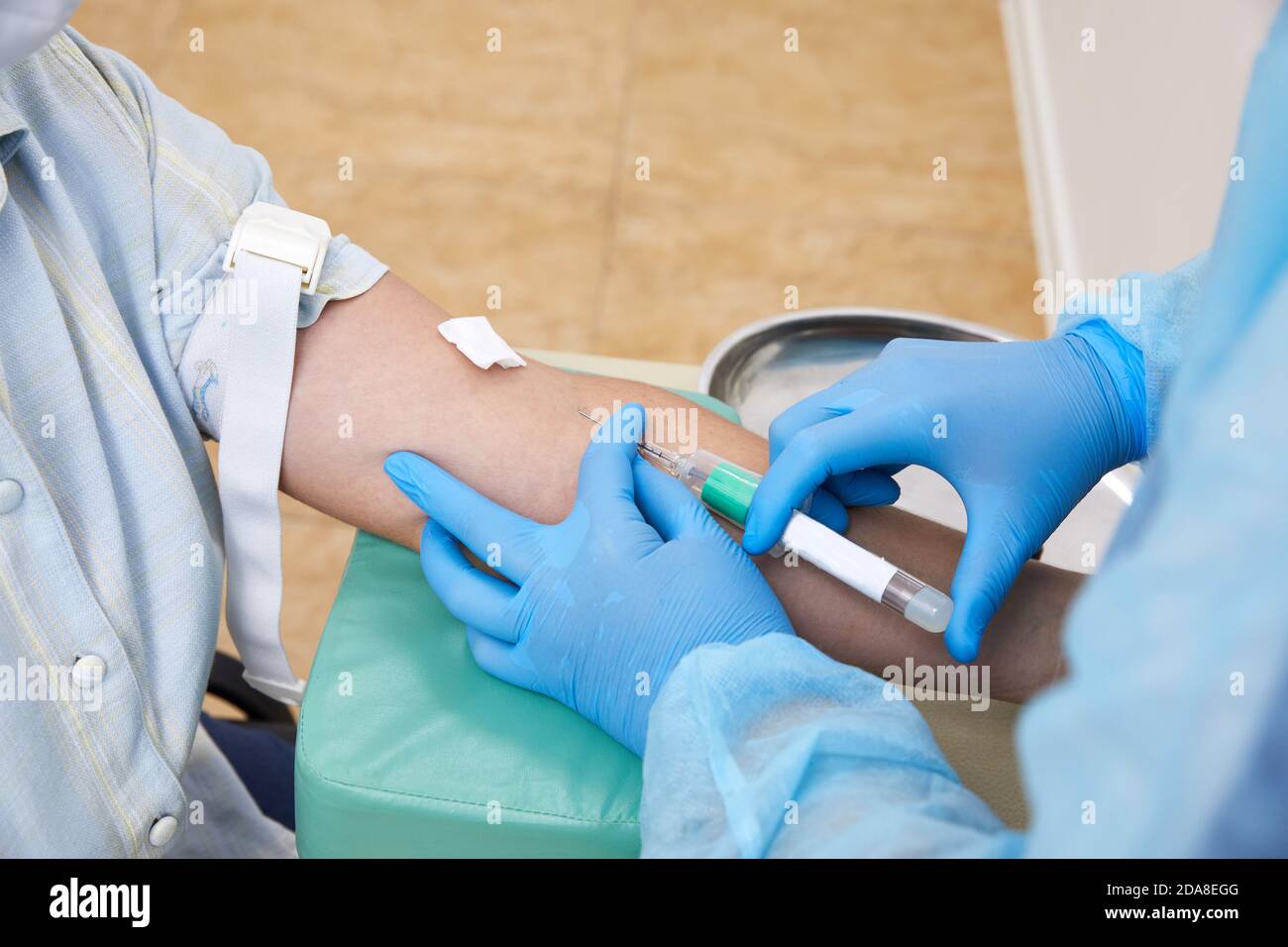 Nurse taking blood sample to make a test in laboratory Stock Photo - Alamy