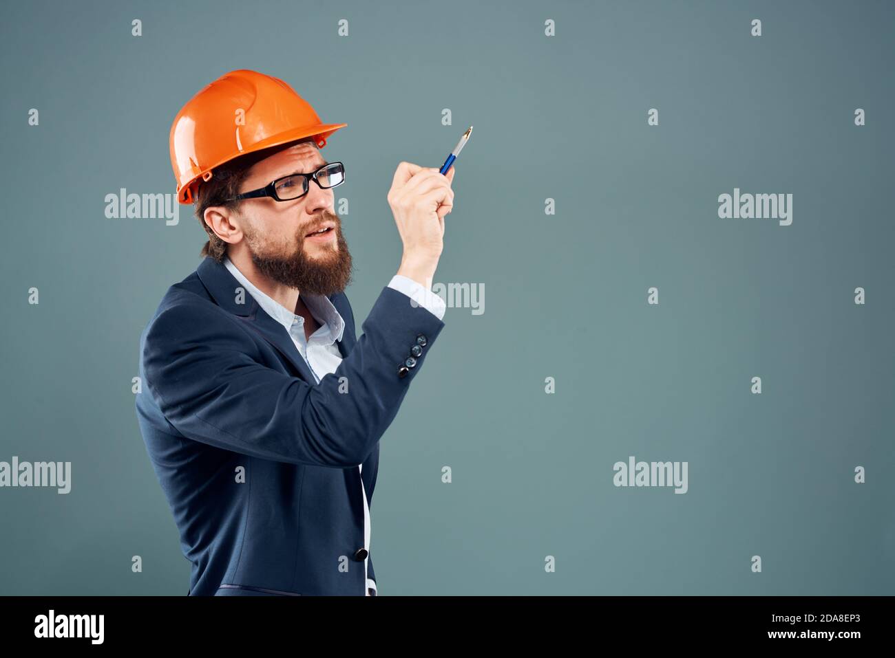 man in orange suit hard hat engineer construction work lifestyle ...