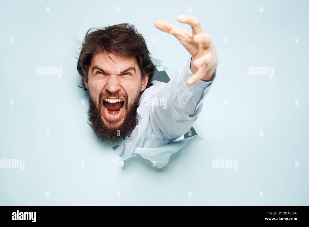Angry man gestures with his hands dissatisfaction emotions work office ...