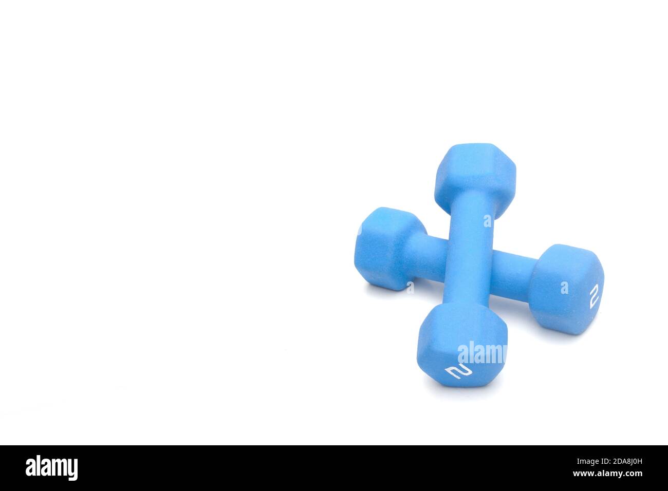 Blue Dumbbells on white with copy space Stock Photo - Alamy