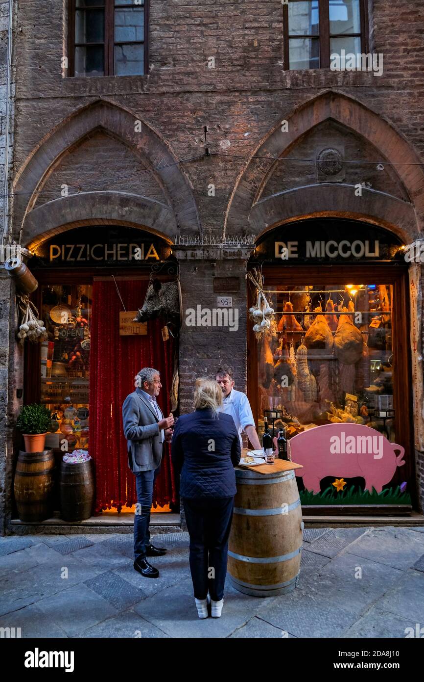 People Outside a Traditional Wine Bar in Siena - Tuscany, Italy Stock ...