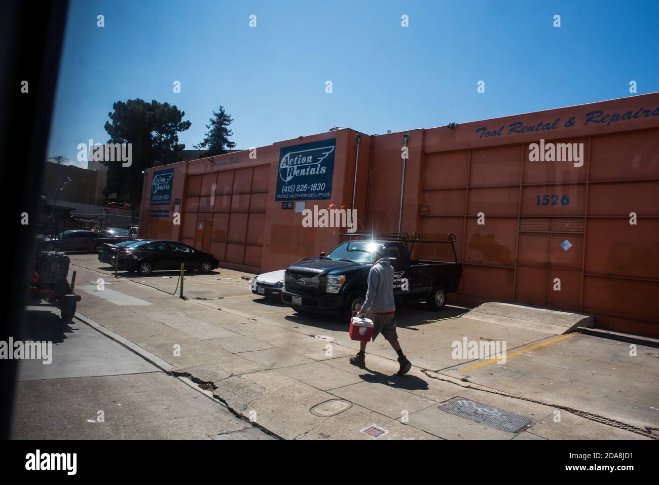 Man walking under the sun Stock Photo - Alamy