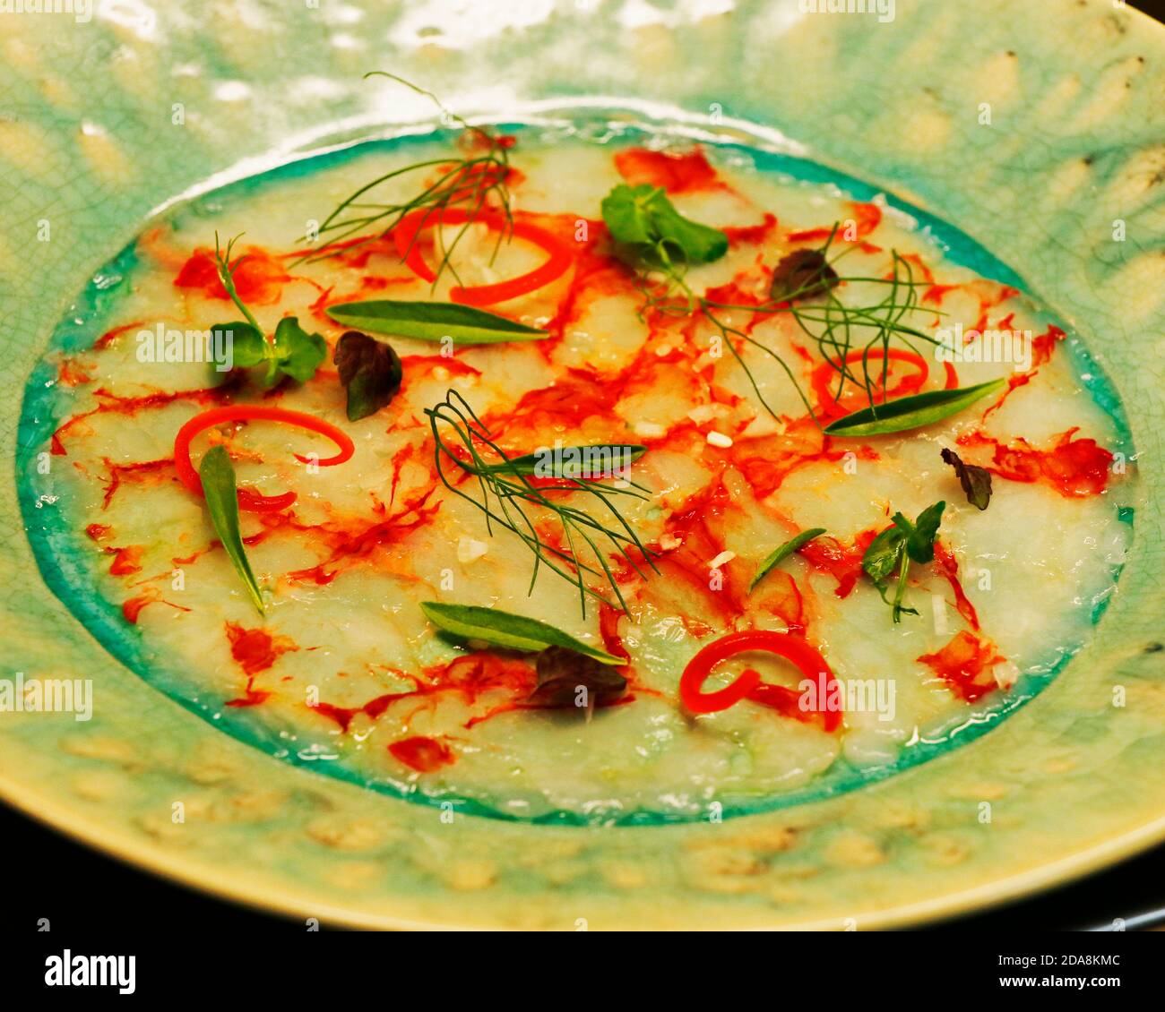 Fish Appetizer Carpaccio of Red Prawns in round plate Stock Photo - Alamy