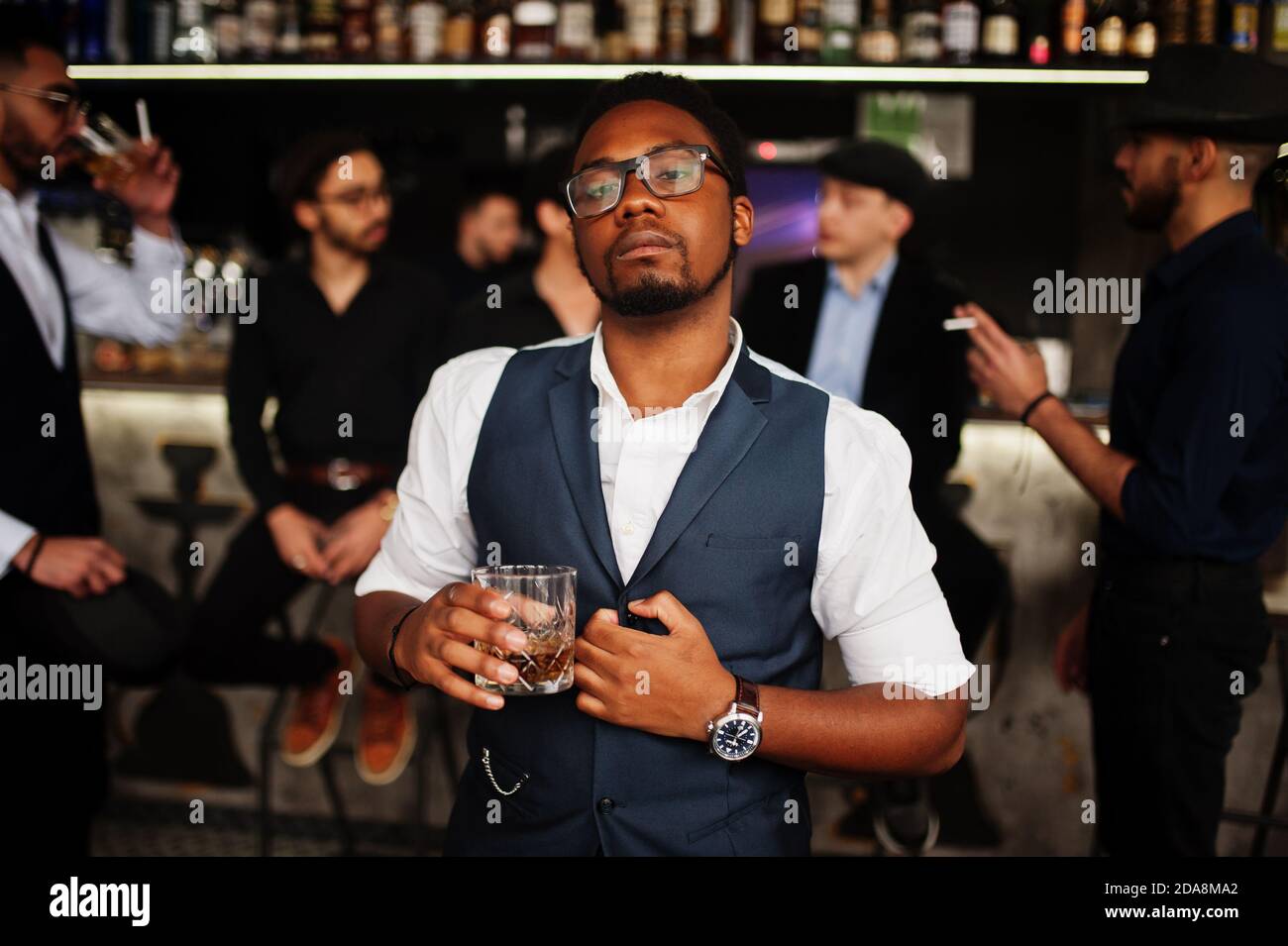 Stylish african american man against group of handsome retro well ...