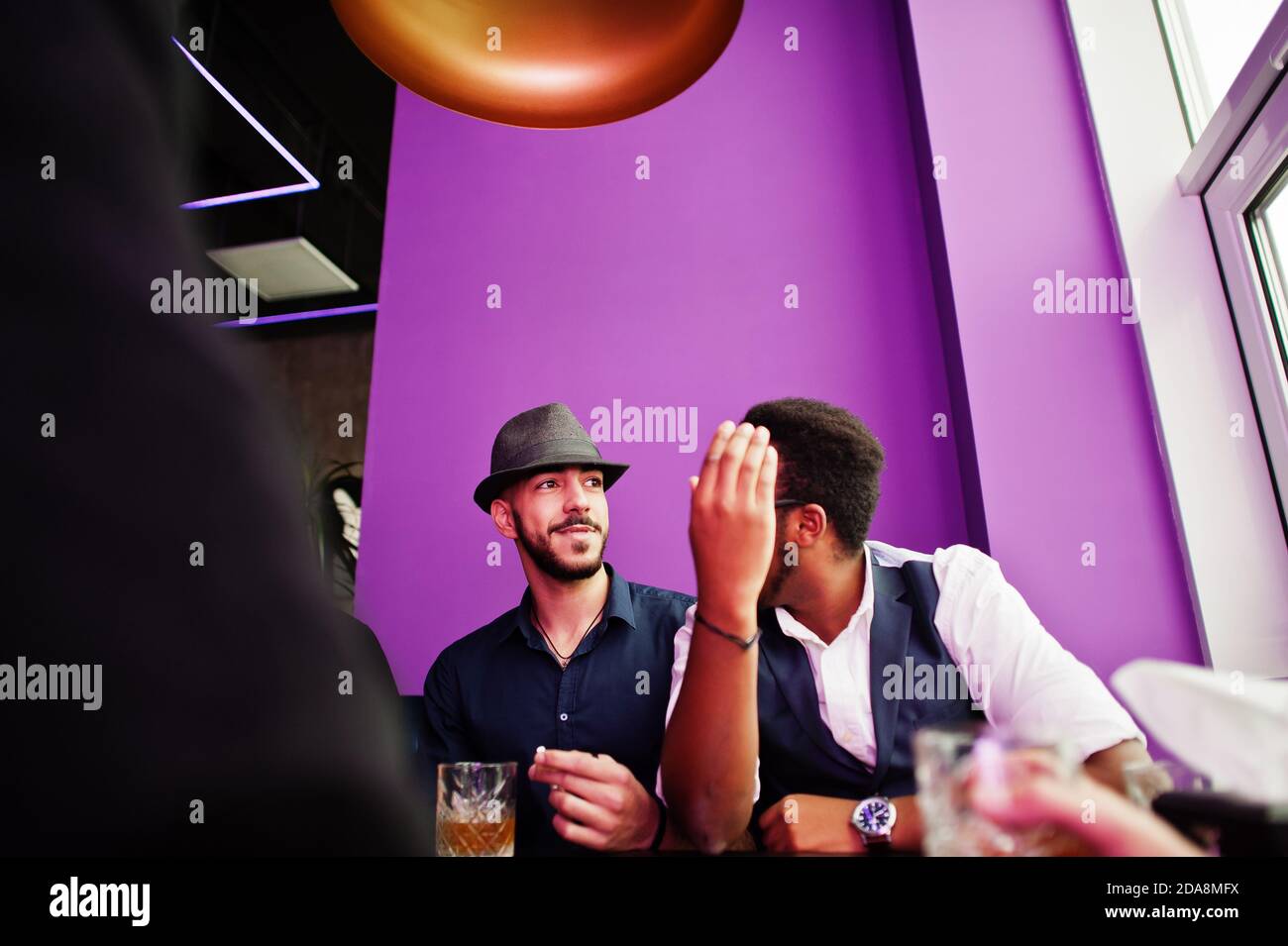 Group of handsome retro well-dressed man gangsters spend time at club ...