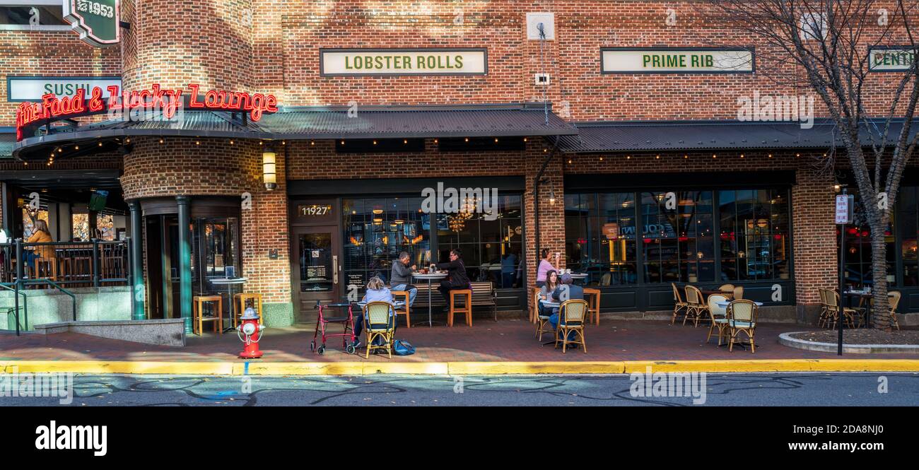 Reston, VA. USA -- November 9, 2020. Photo of people dining outside in ...