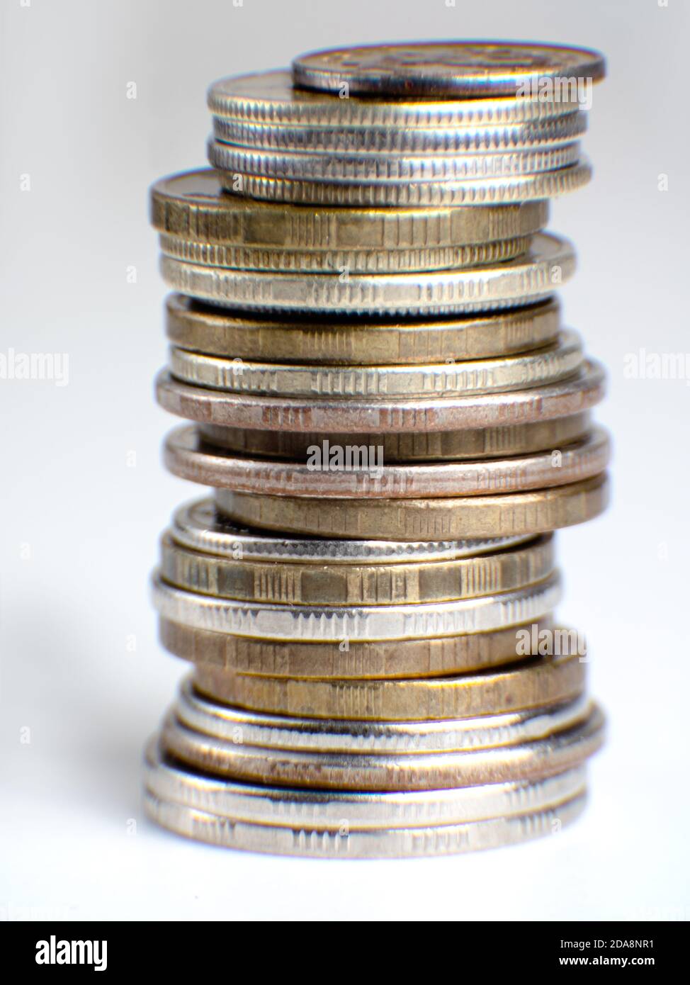 Coins Isolated on White Background. Macro photo column of coins Stock ...