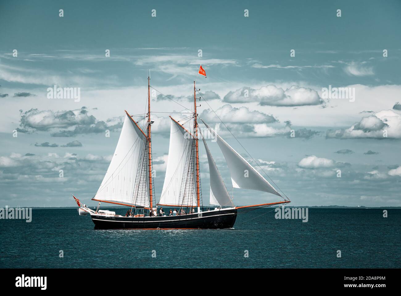 Big sailboat is in the sea on sky background Stock Photo - Alamy