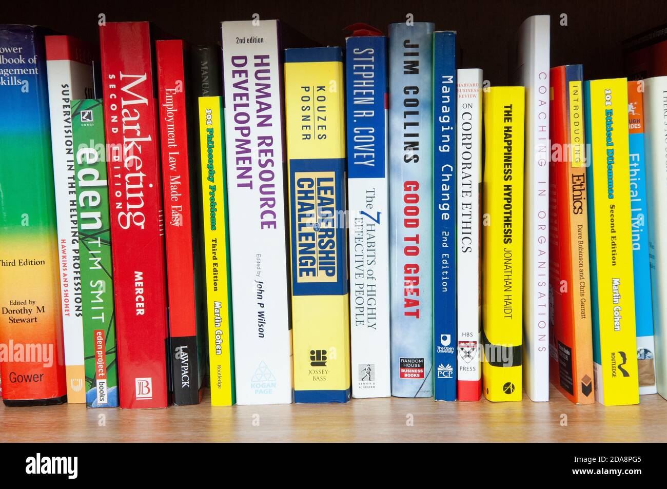 Management and Leadership books on a bookshelf Stock Photo - Alamy