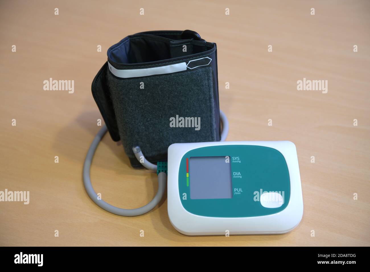 Pressure gauge. Digital blood pressure monitor on the table. Medical ...