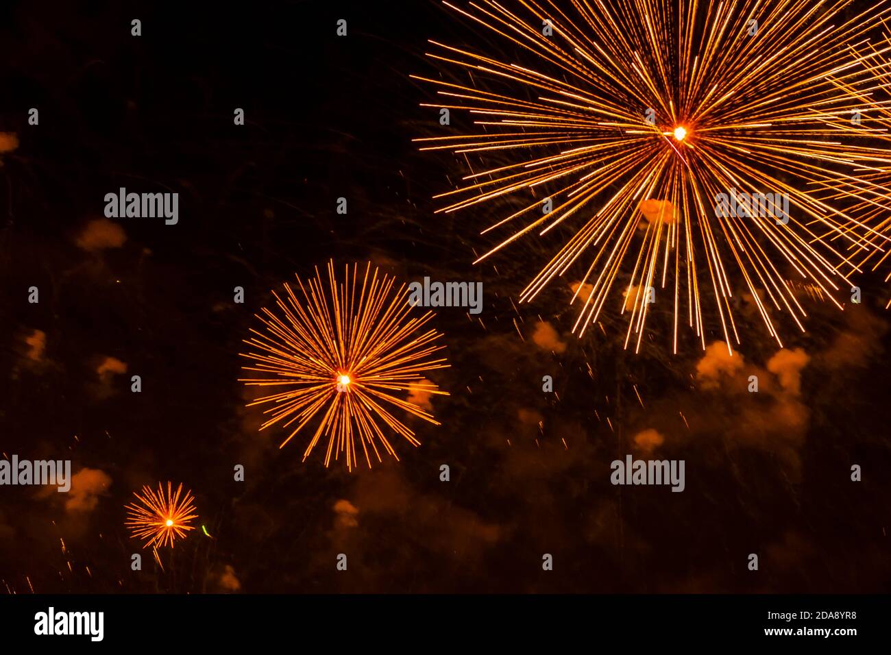 Fireworks bursting, low angle view of colorful firework exploding in ...