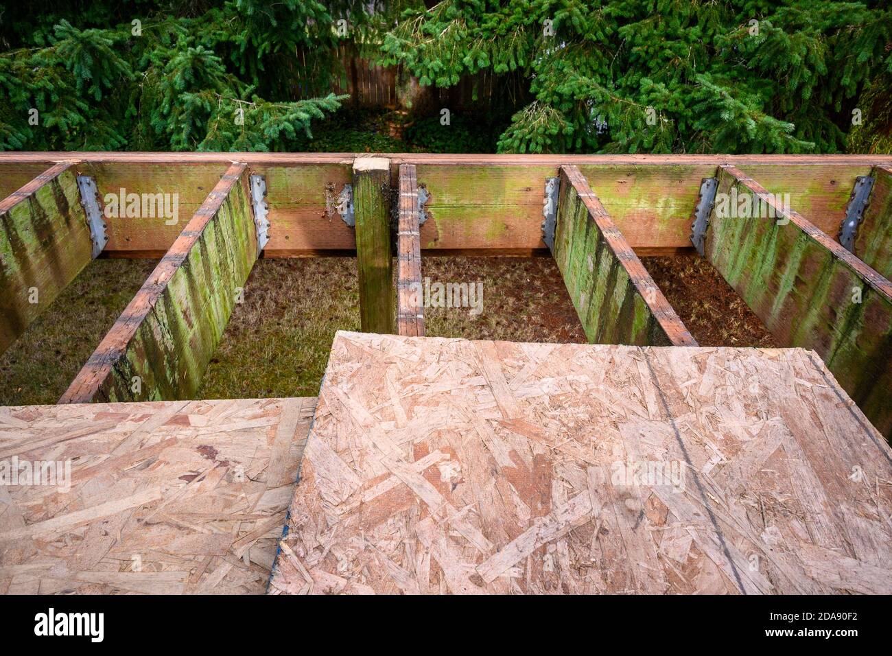 Summer construction, outdoor deck under construction, old support ...