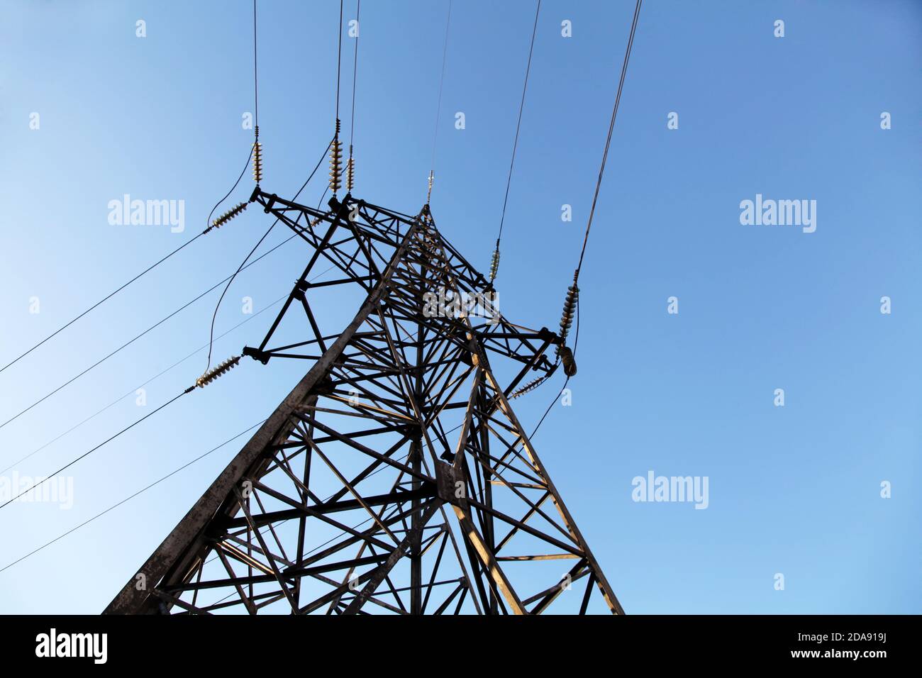 Electric power pylon and overhead lines tower used transmit electrical ...