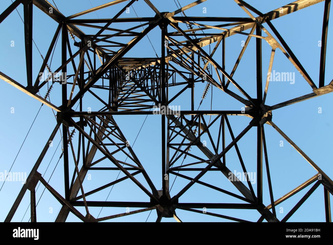 Electric power pylon and overhead lines tower used transmit electrical ...