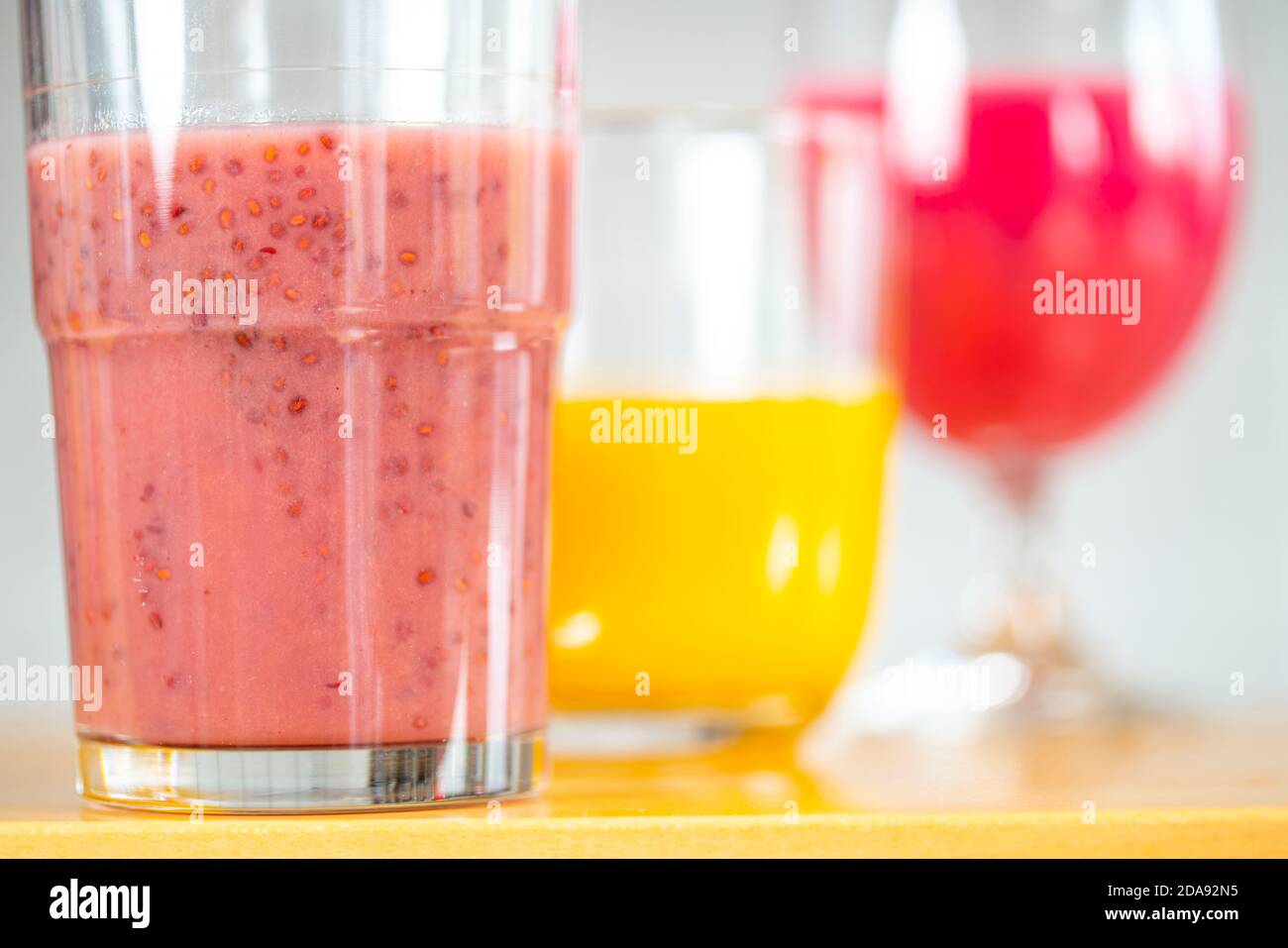Smoothies, puree juice of various fruits Stock Photo - Alamy