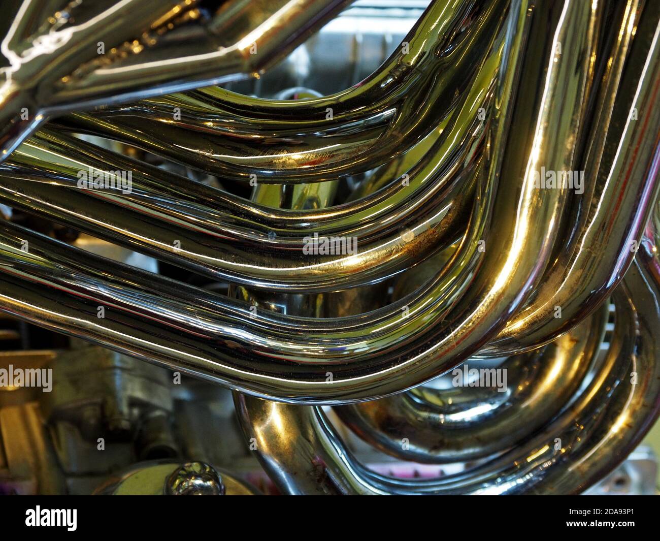tubular pipes - tangle of multiple shiny chrome motorbike exhaust pipes ...