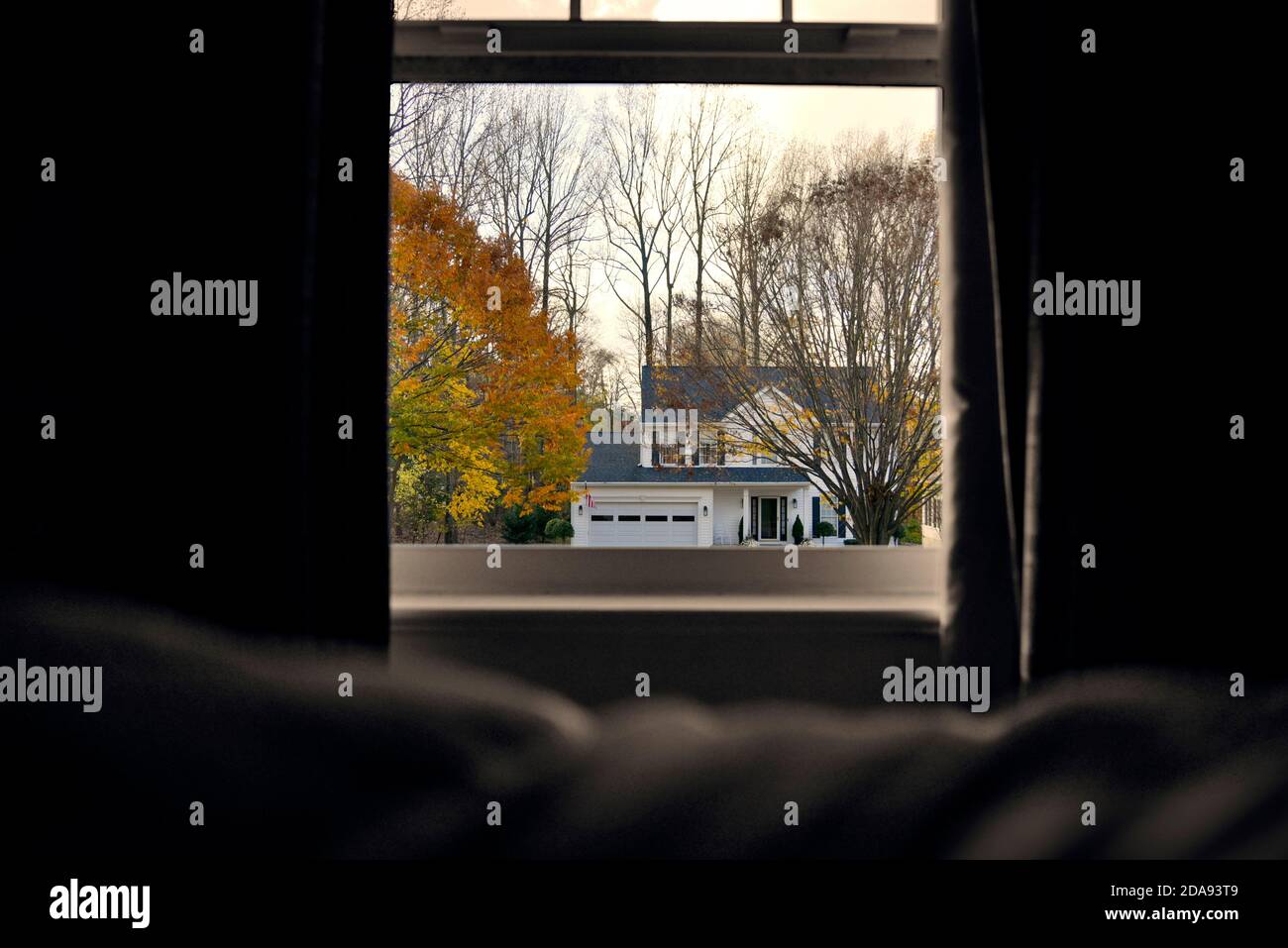 House across the street in fall hi-res stock photography and images - Alamy