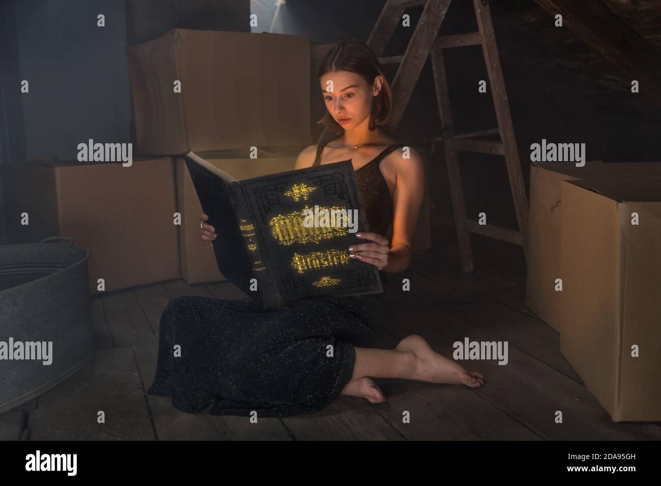 Female reading large book hi-res stock photography and images - Alamy