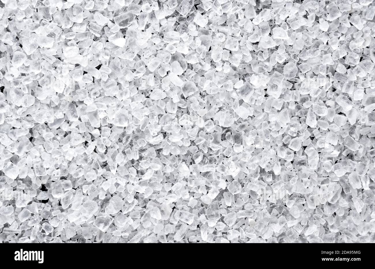 Himalayan rock salt spread over the entire screen. Texture. Close-Up ...