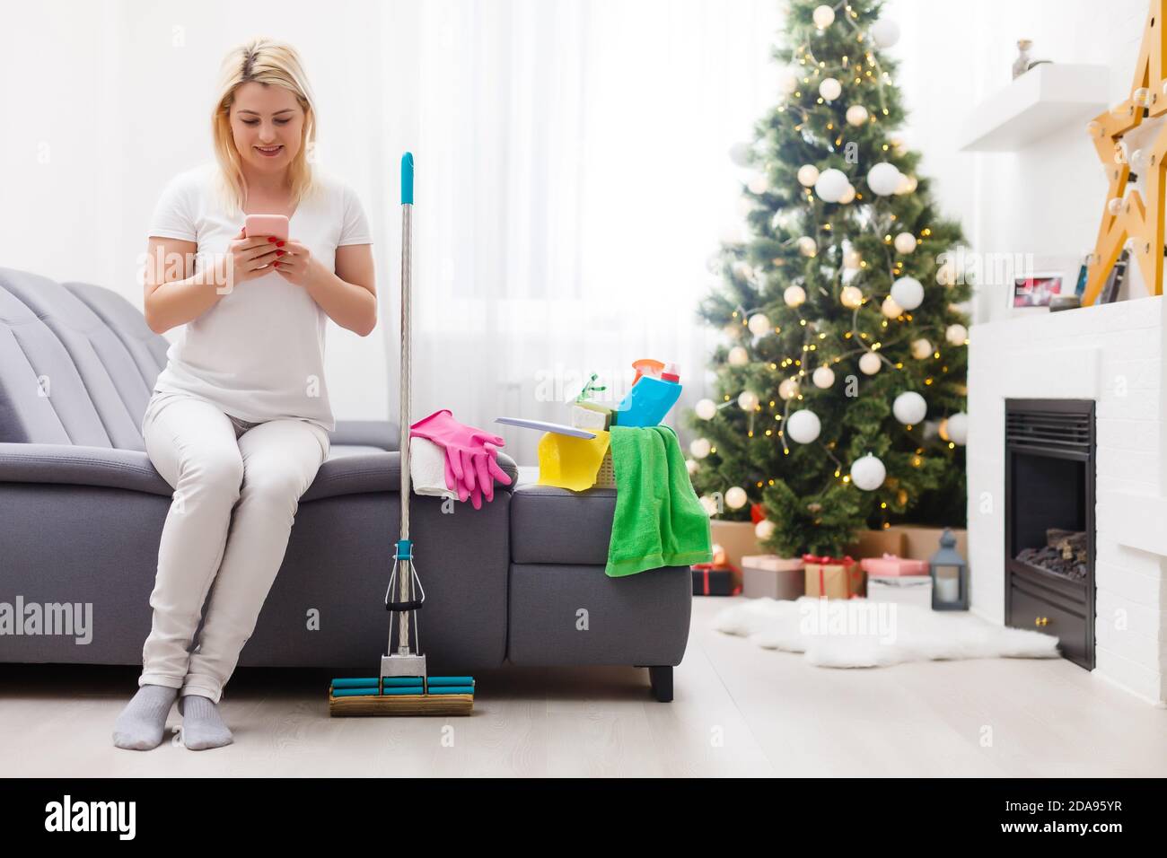 Woman cleaning up after party hi-res stock photography and images - Alamy