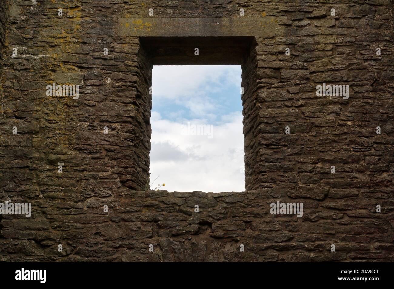 View of sky through empty window frame in old industrial building ...