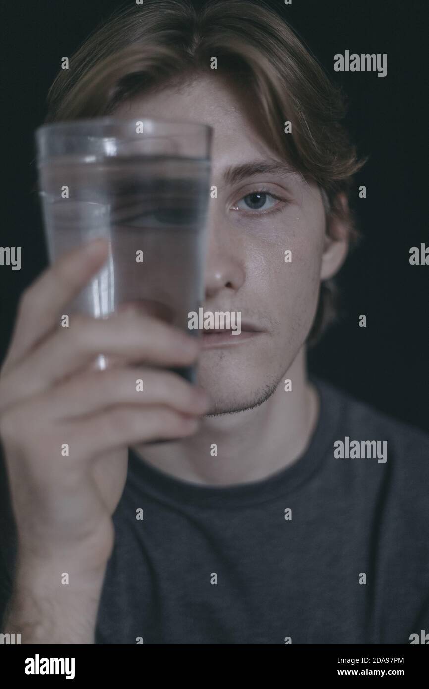 a very lonely guy at home suffers from the fact that he is alone and ...