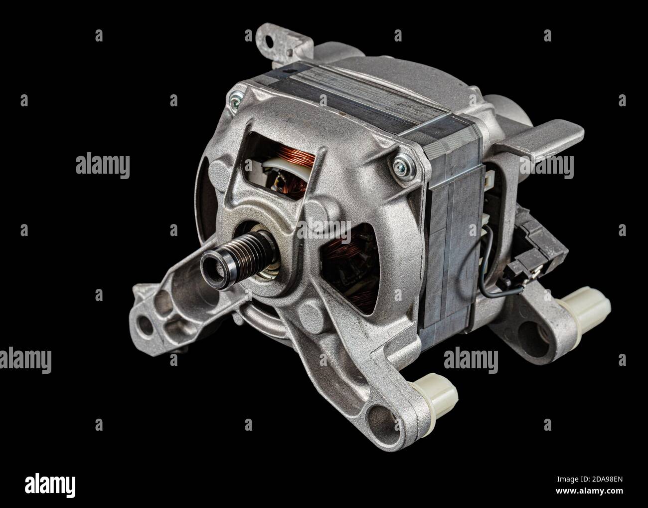 Electric motor isolated on black background Stock Photo - Alamy