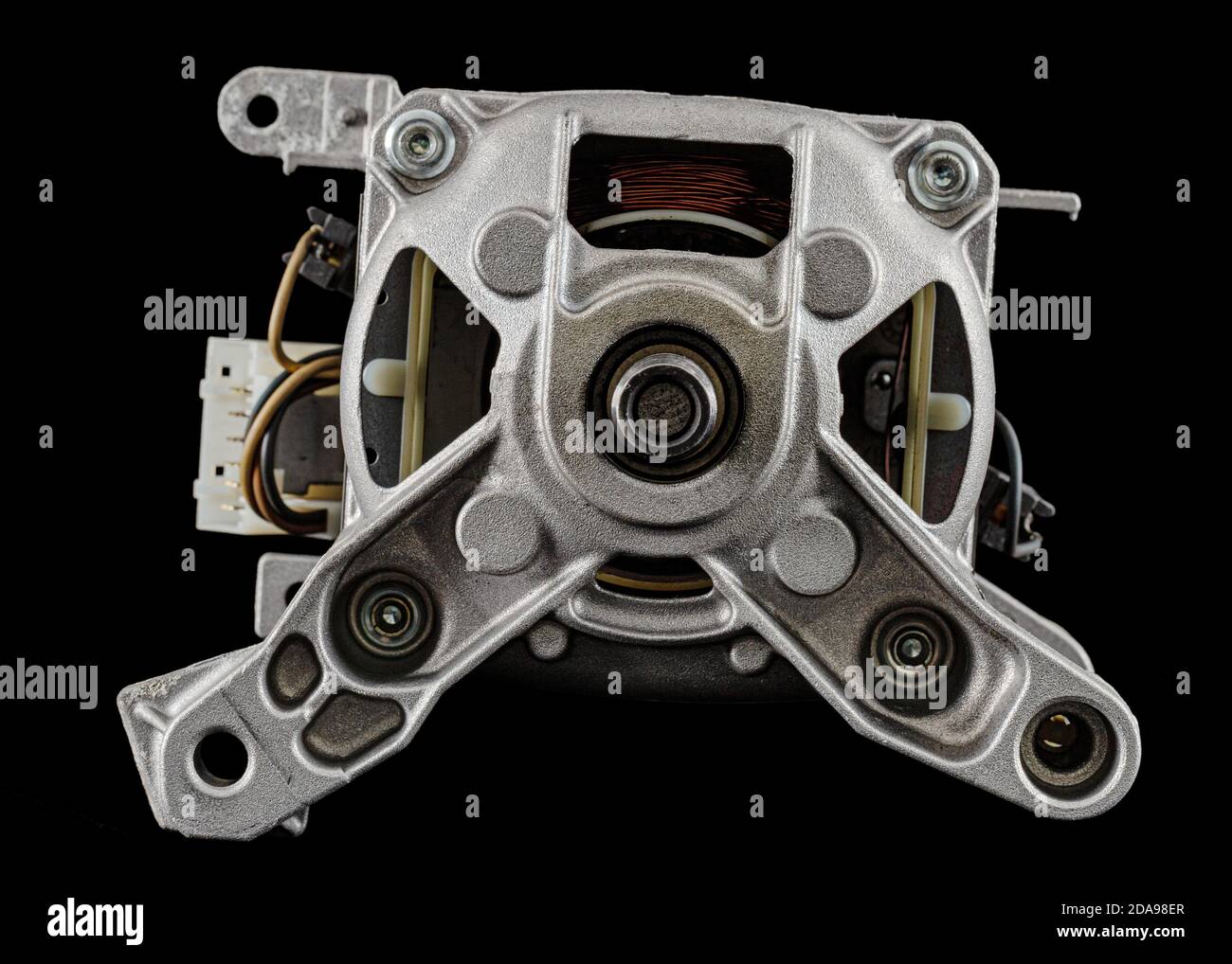 Electric motor isolated on black background Stock Photo - Alamy