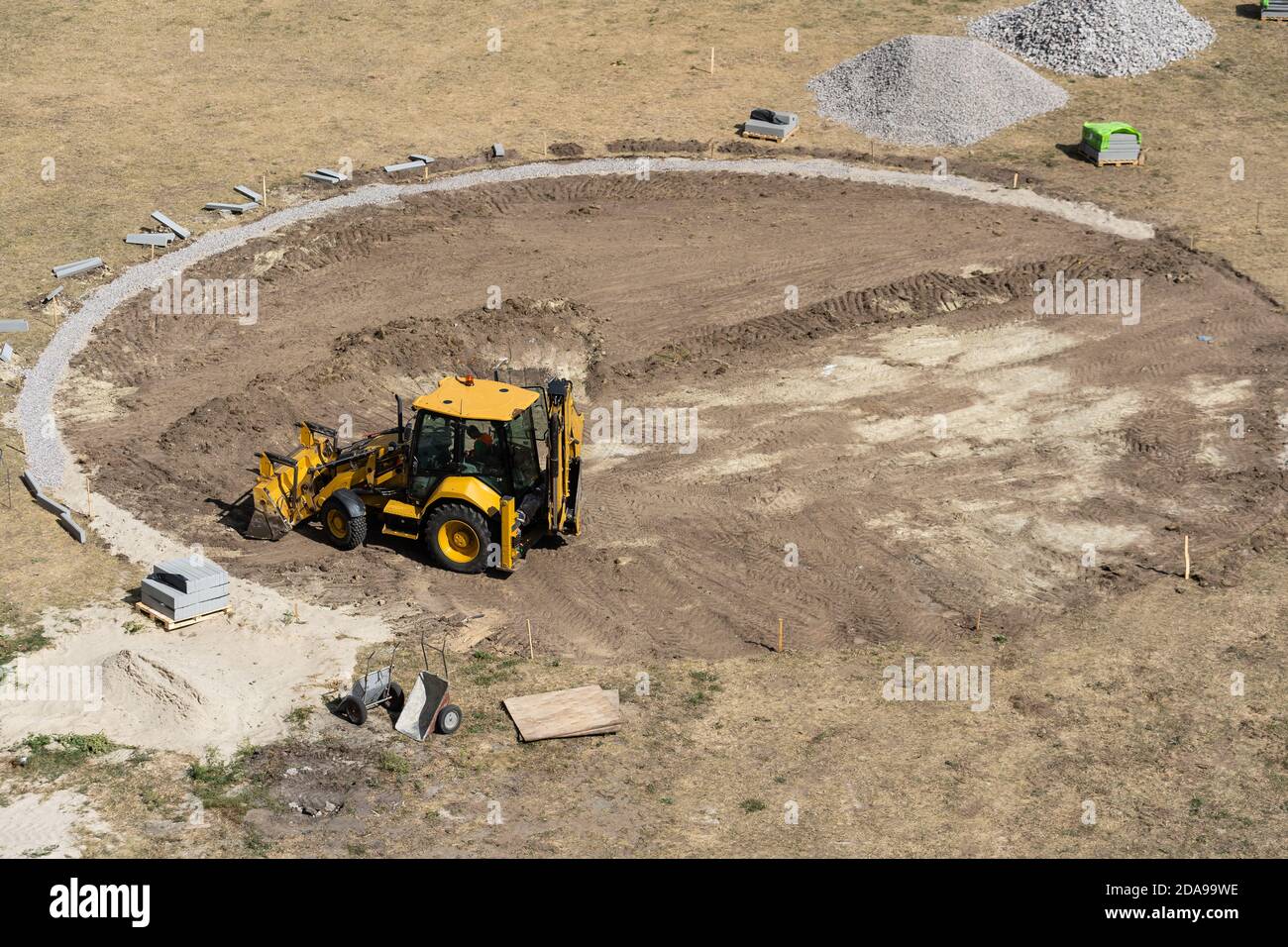 Excavator during earthmoving at construction site. ?onstruction ...