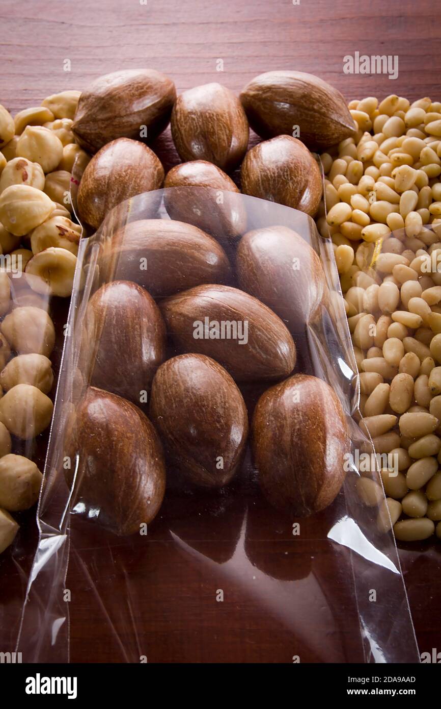 Pecan nuts in shell in transparent packaging Stock Photo - Alamy