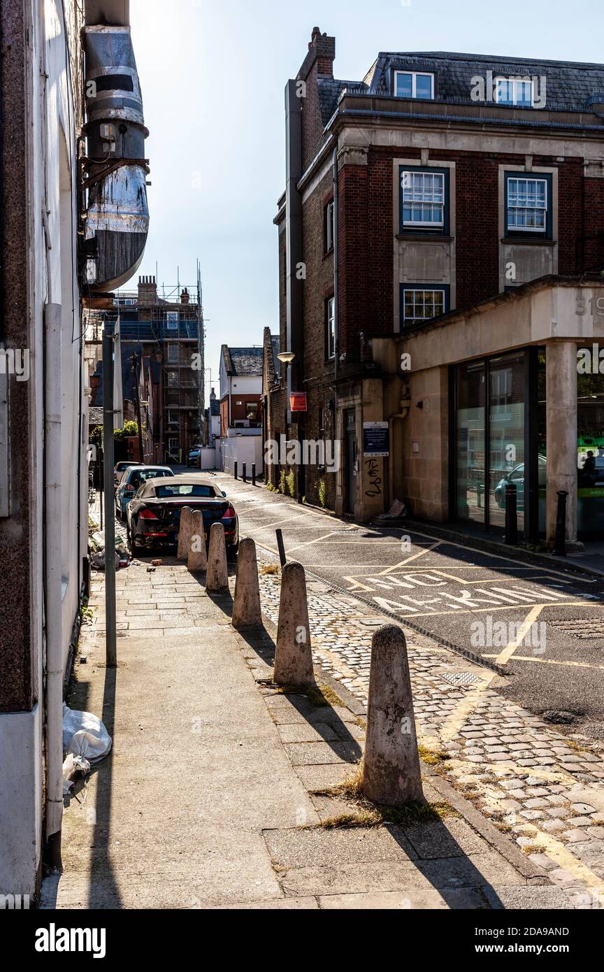 A row of bollards along a one way street, West Hampstead, London ...