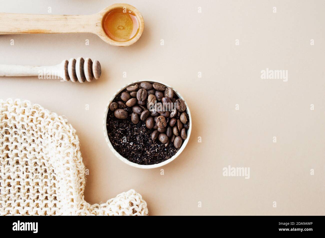 Coffee scrub in gold jar, honey, cosmetic oil, wooden stick for honey ...