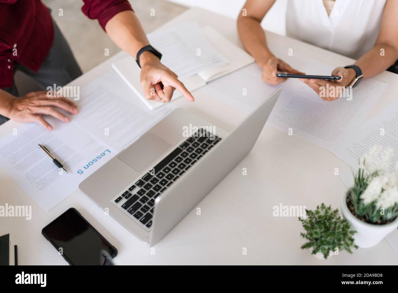 Young students campus helps friend catching up and learning tutoring. People, learning ...