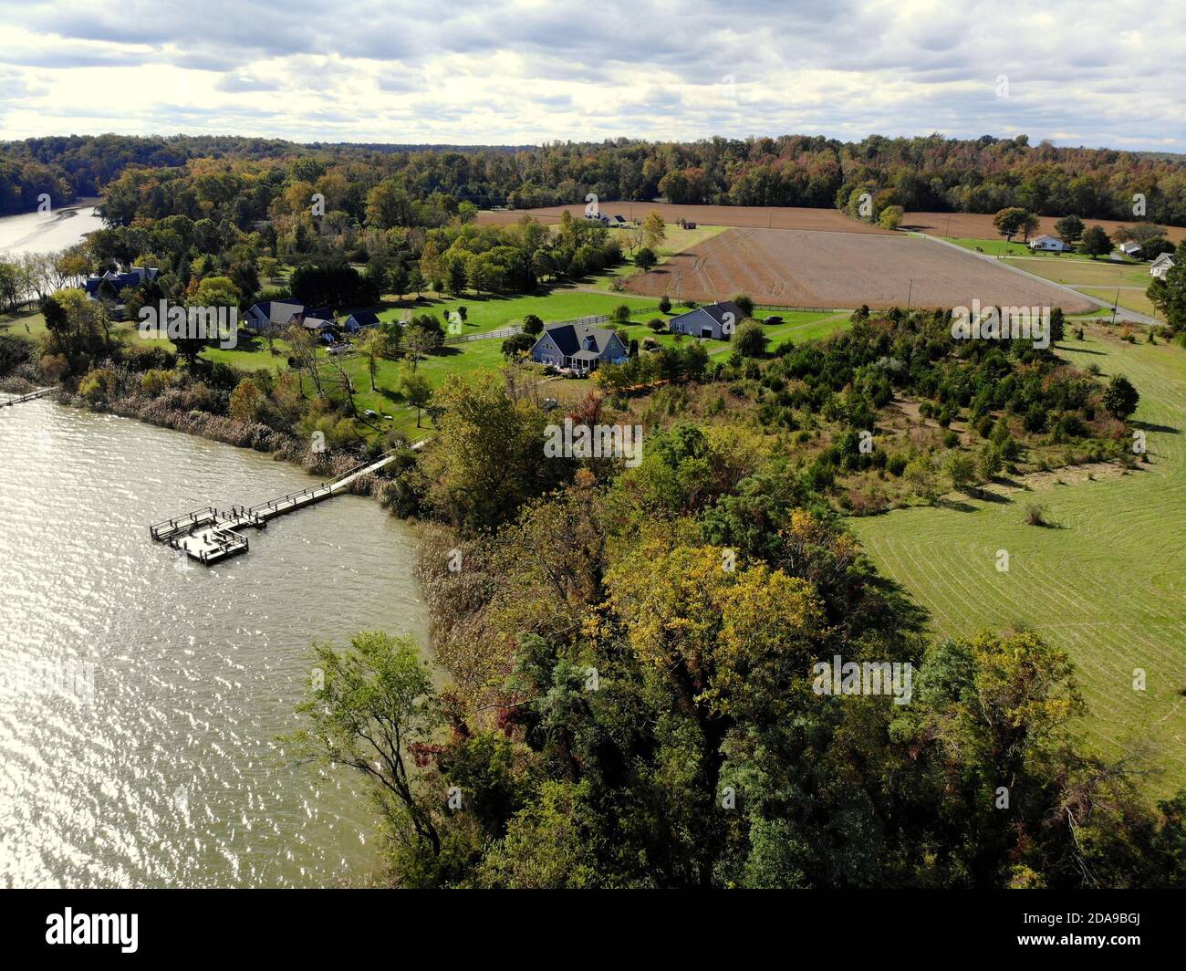 The aerial view of the boat dock and neighborhood near Currioman Bay ...