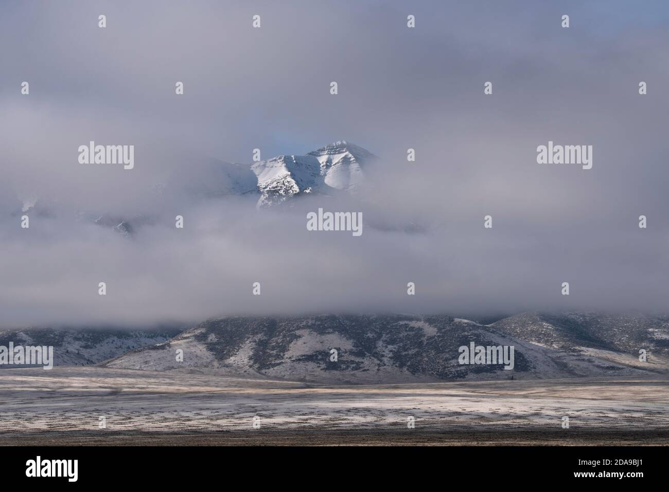 The southern Lemhi Range in Idaho emerge from the clouds after a spring ...