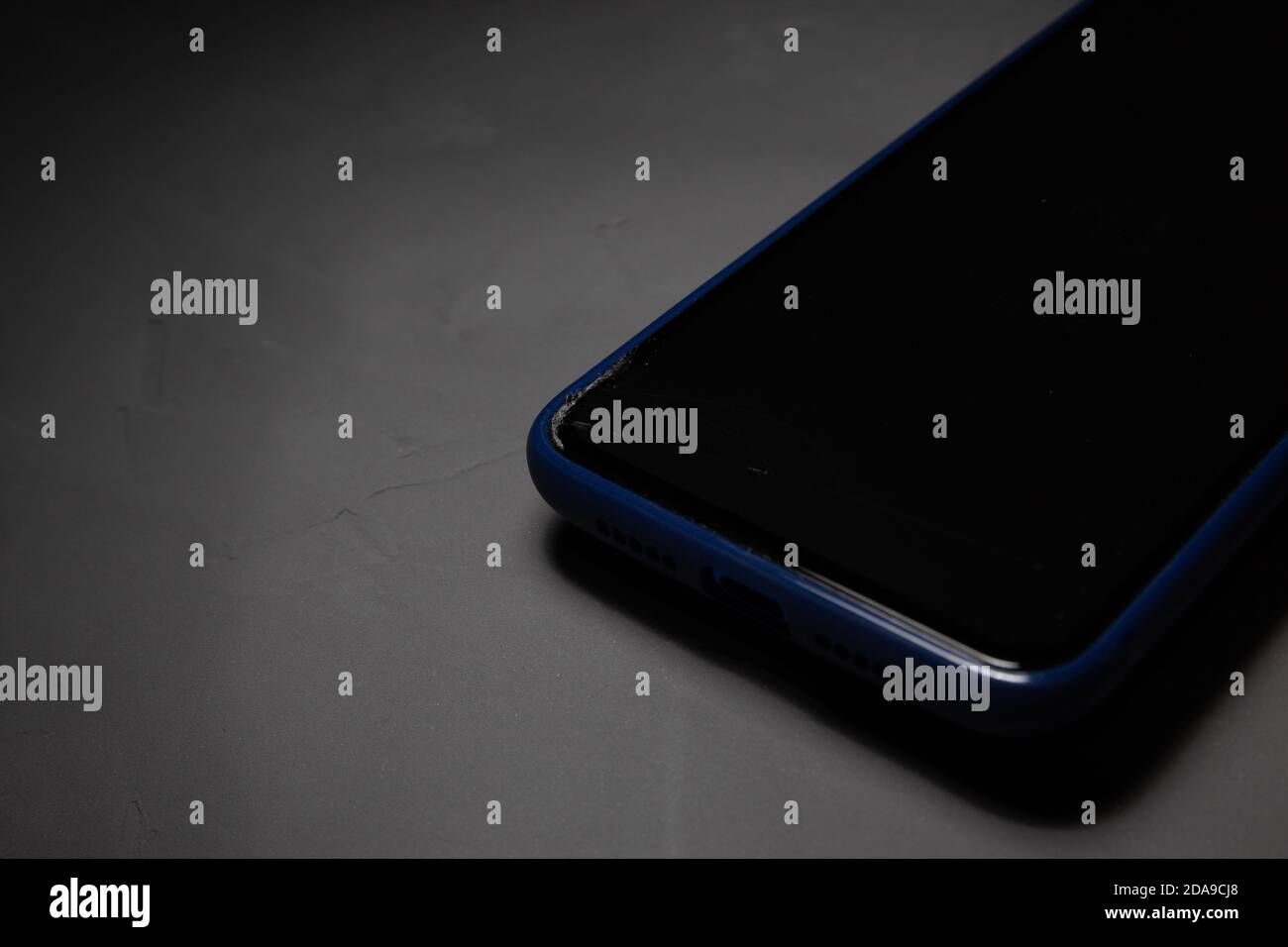 Cracked smartphone screen. Broken glass on phones display. The ...