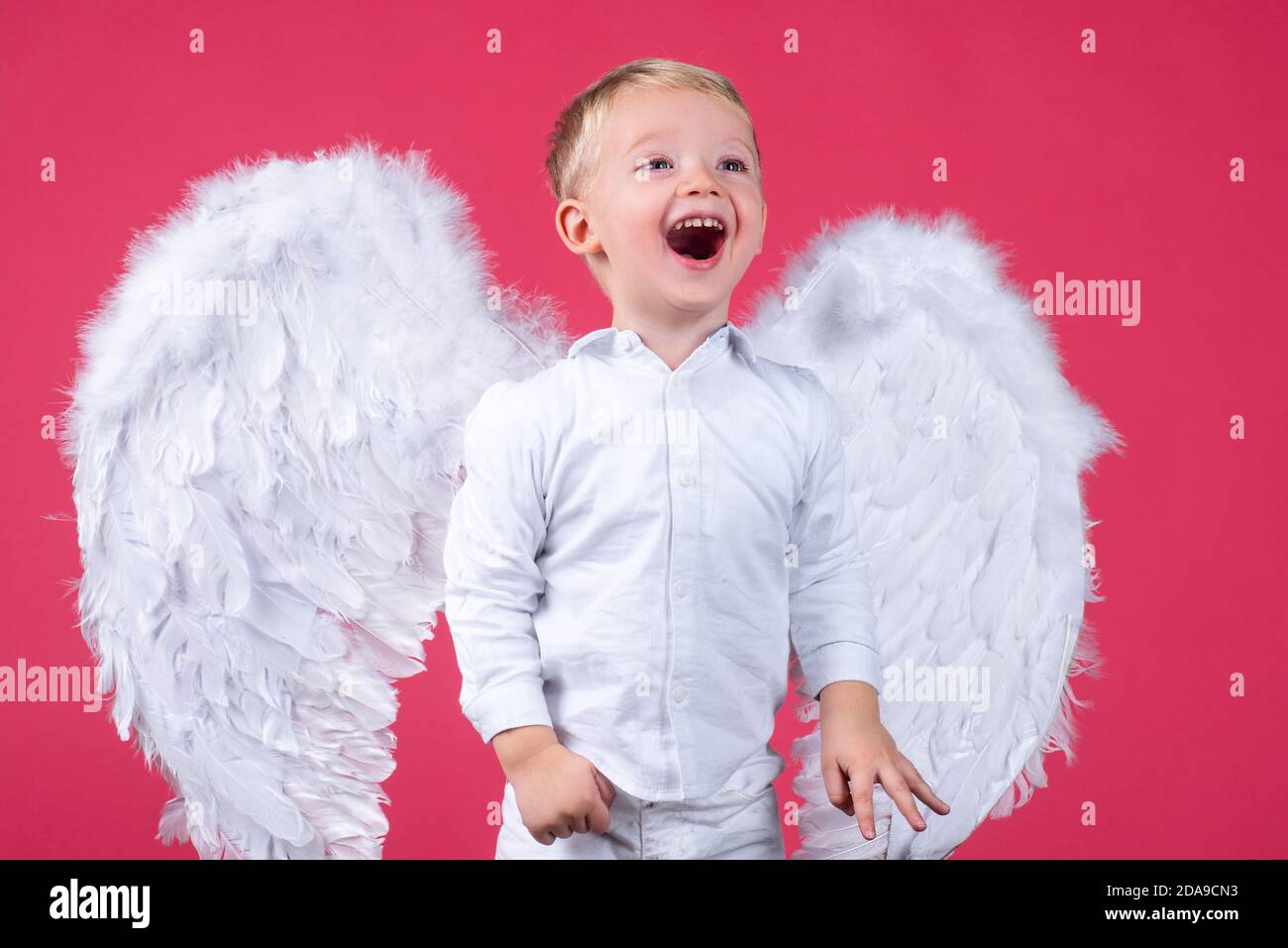 Child boy wearing angel costume hi-res stock photography and images - Alamy