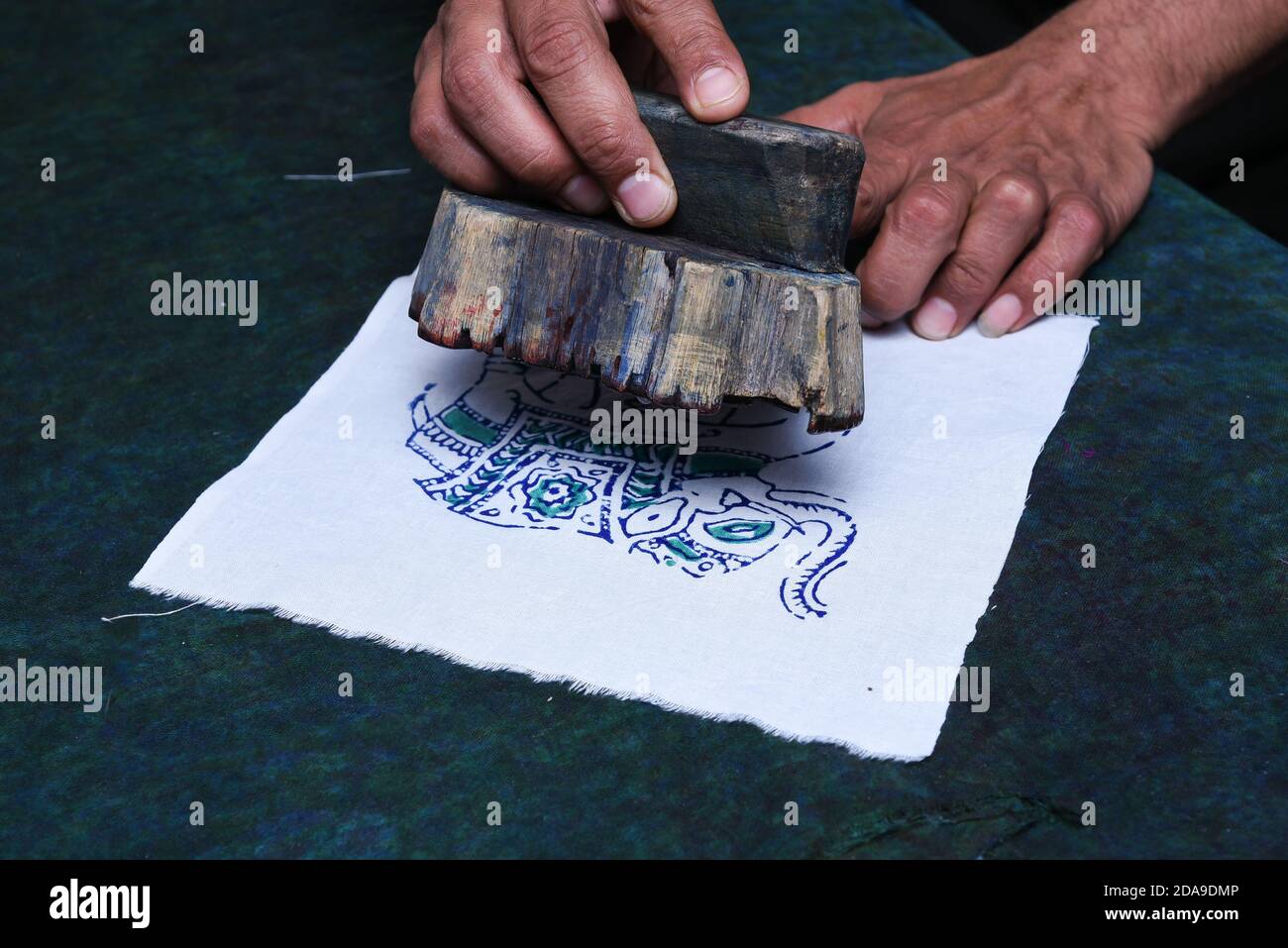 Indian man doing wood Block Printing for Textile in India by hand ...