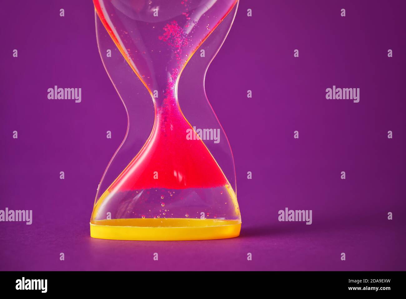 Hourglass on color background. Time management concept Stock Photo - Alamy