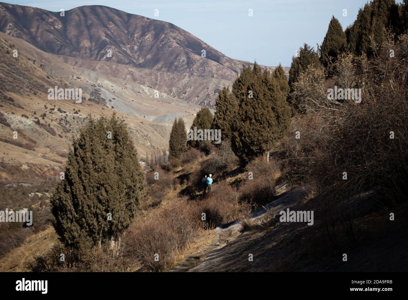 Hiking to the frozen waterfall at Issyk Ata in Kyrgyzstan's Chuy Oblast ...