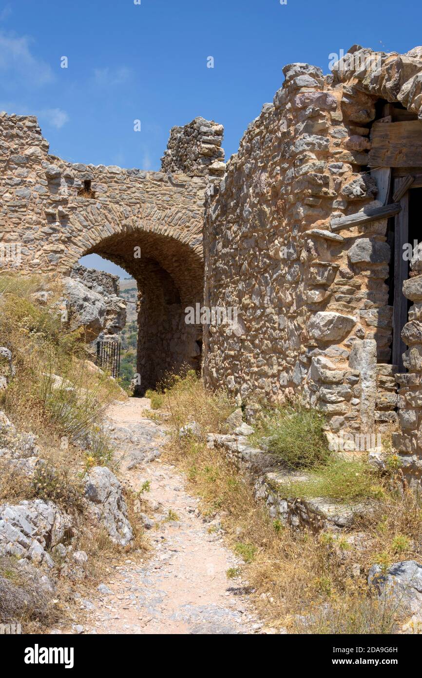 The narrow path and arched pass between the houses in the historical ...