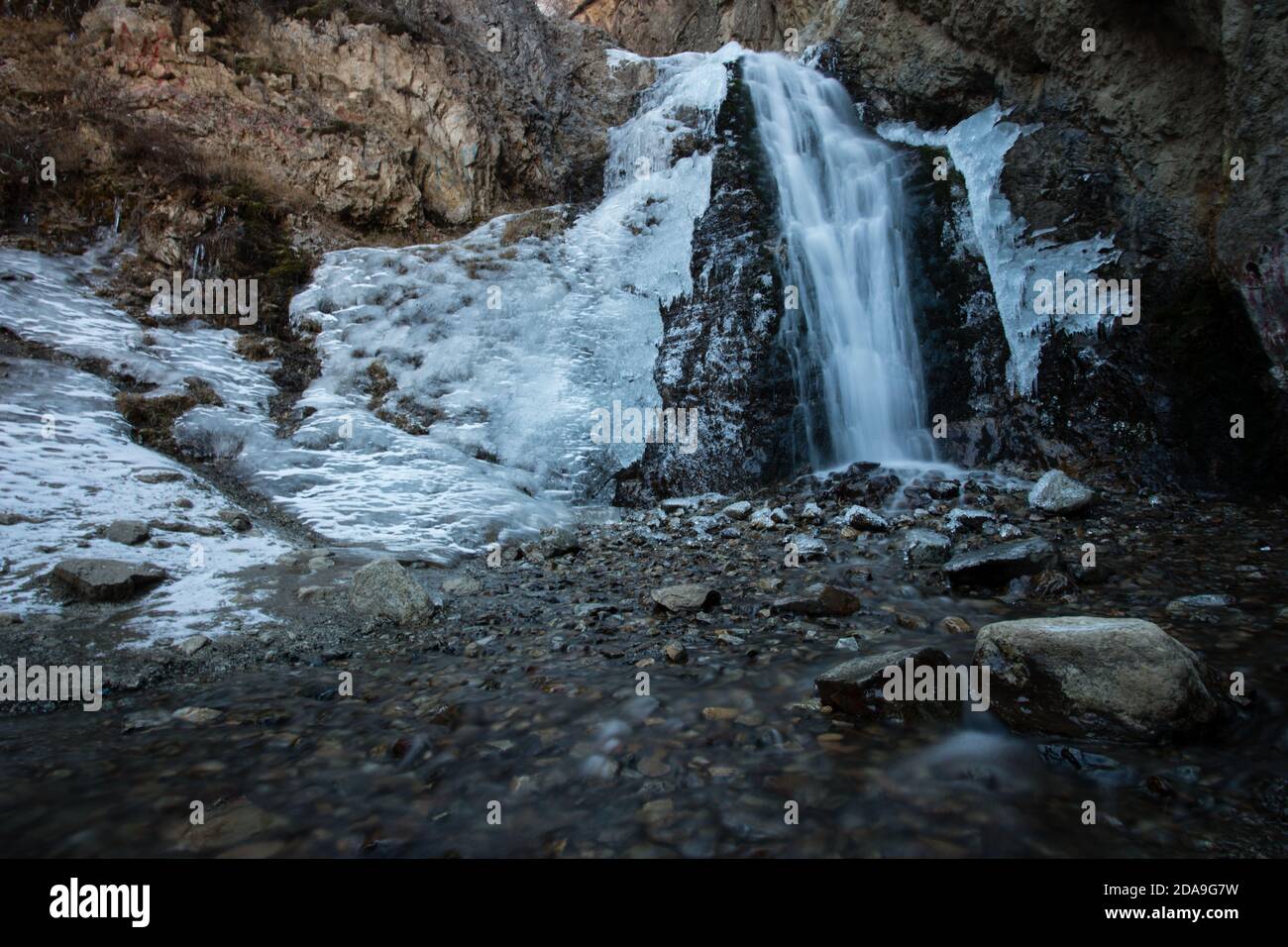 Hiking to the frozen waterfall at Issyk Ata in Kyrgyzstan's Chuy Oblast ...